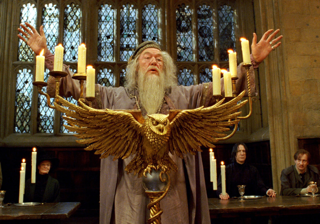 Dumbledore with hands raised — Harry Potter Fan Zone