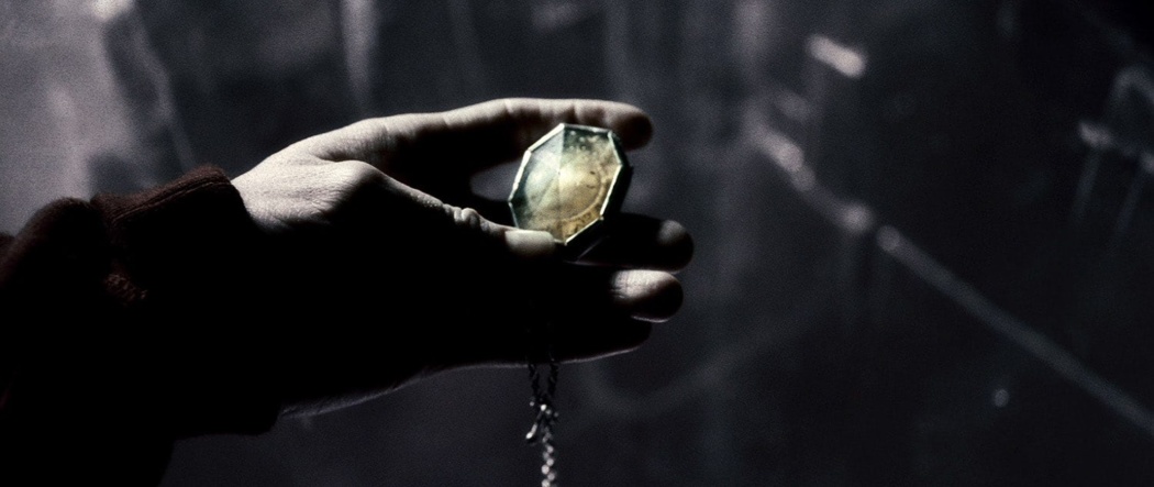Holding the locket Horcrux — Harry Potter Fan Zone