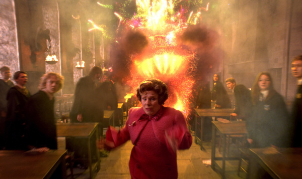 Umbridge runs from the fire dragon — Harry Potter Fan Zone